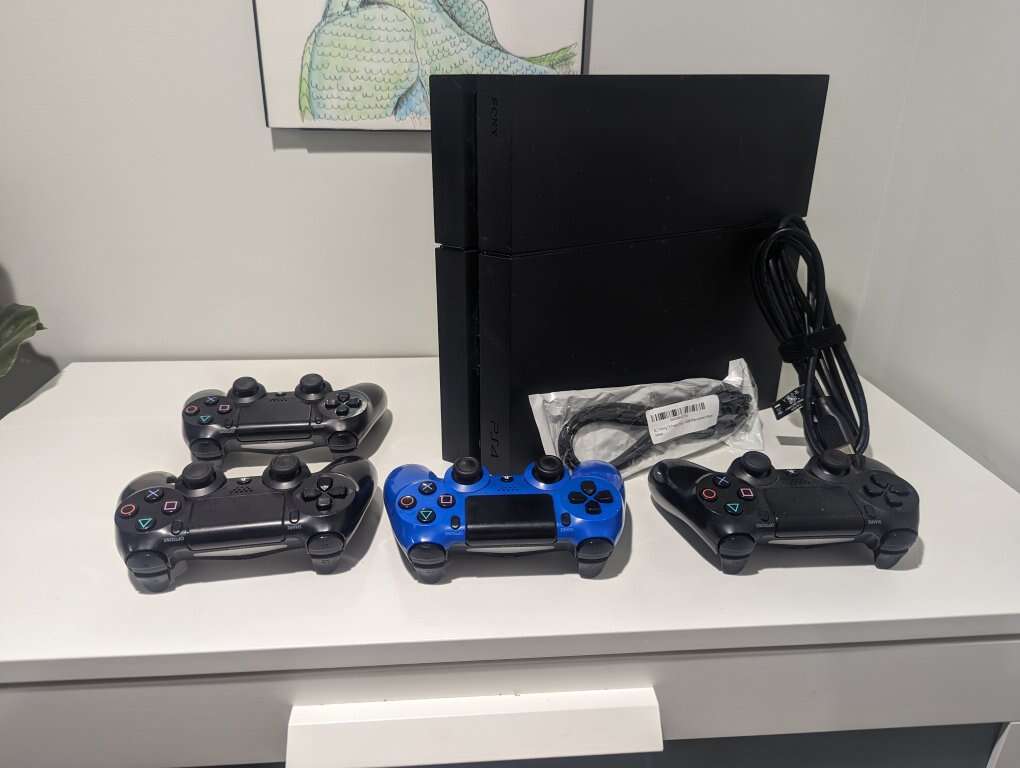 PS4 w/4 controllers w/all cords and… | Electronics | ksl.com