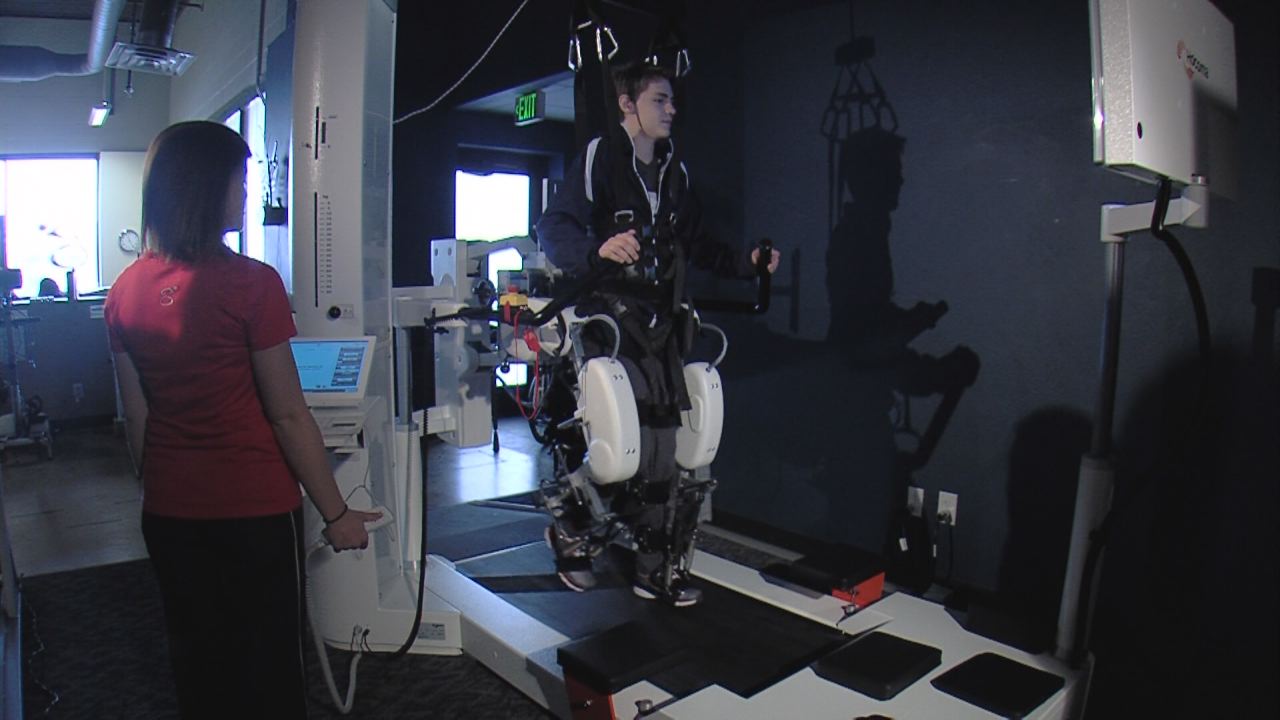Paralysis victims relearn to walk with robotic device | KSL.com