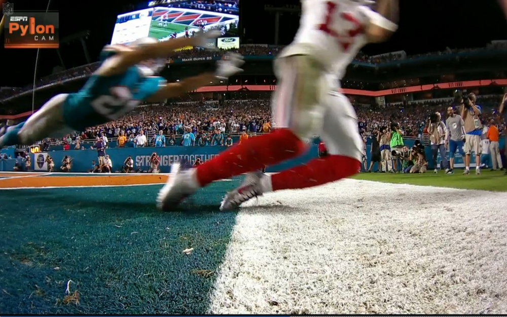 Pylon cam gets remarkable angle on touchdown catch, player dunks on his ...