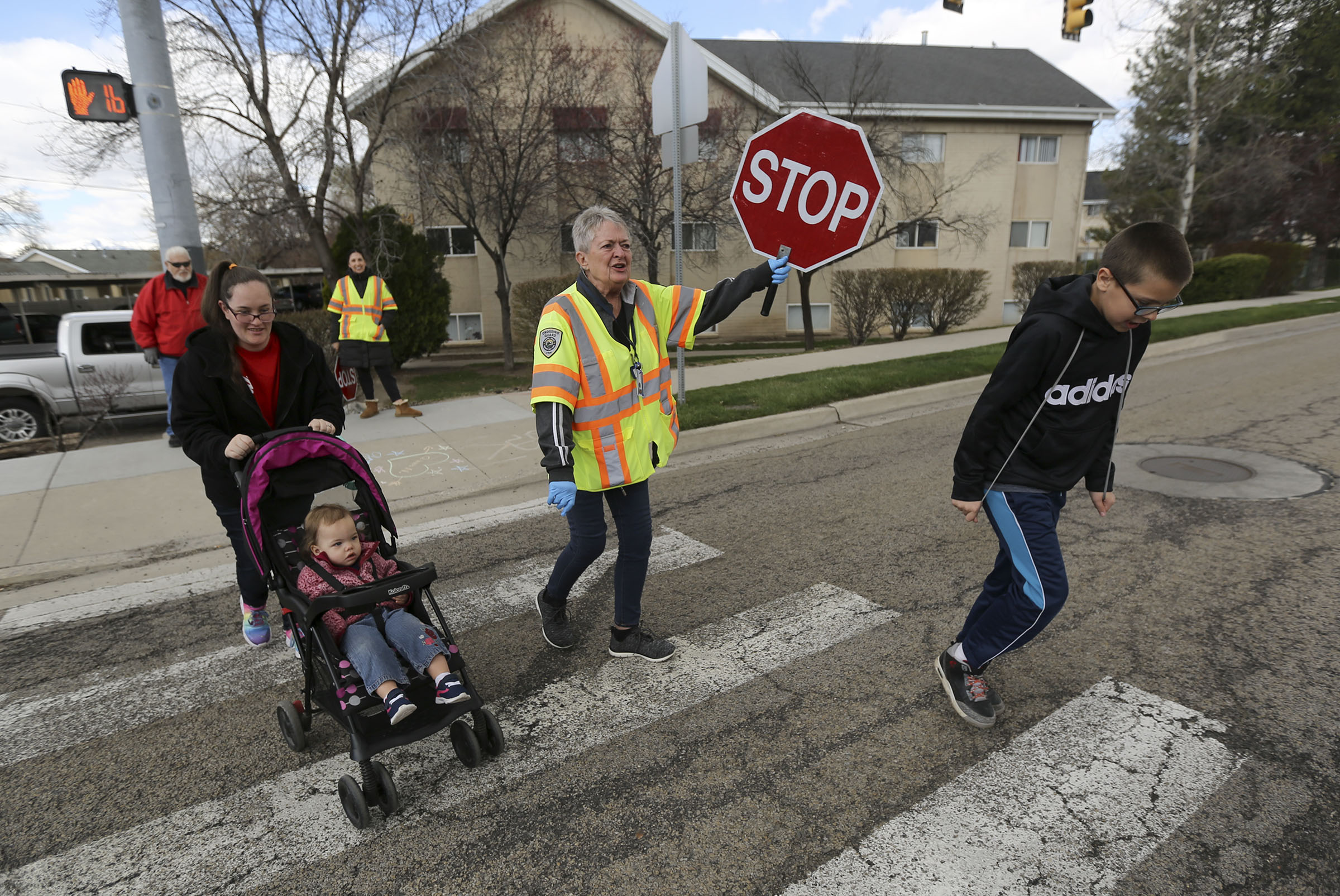 Crossing guards continue services amid pandemic, helping students ...