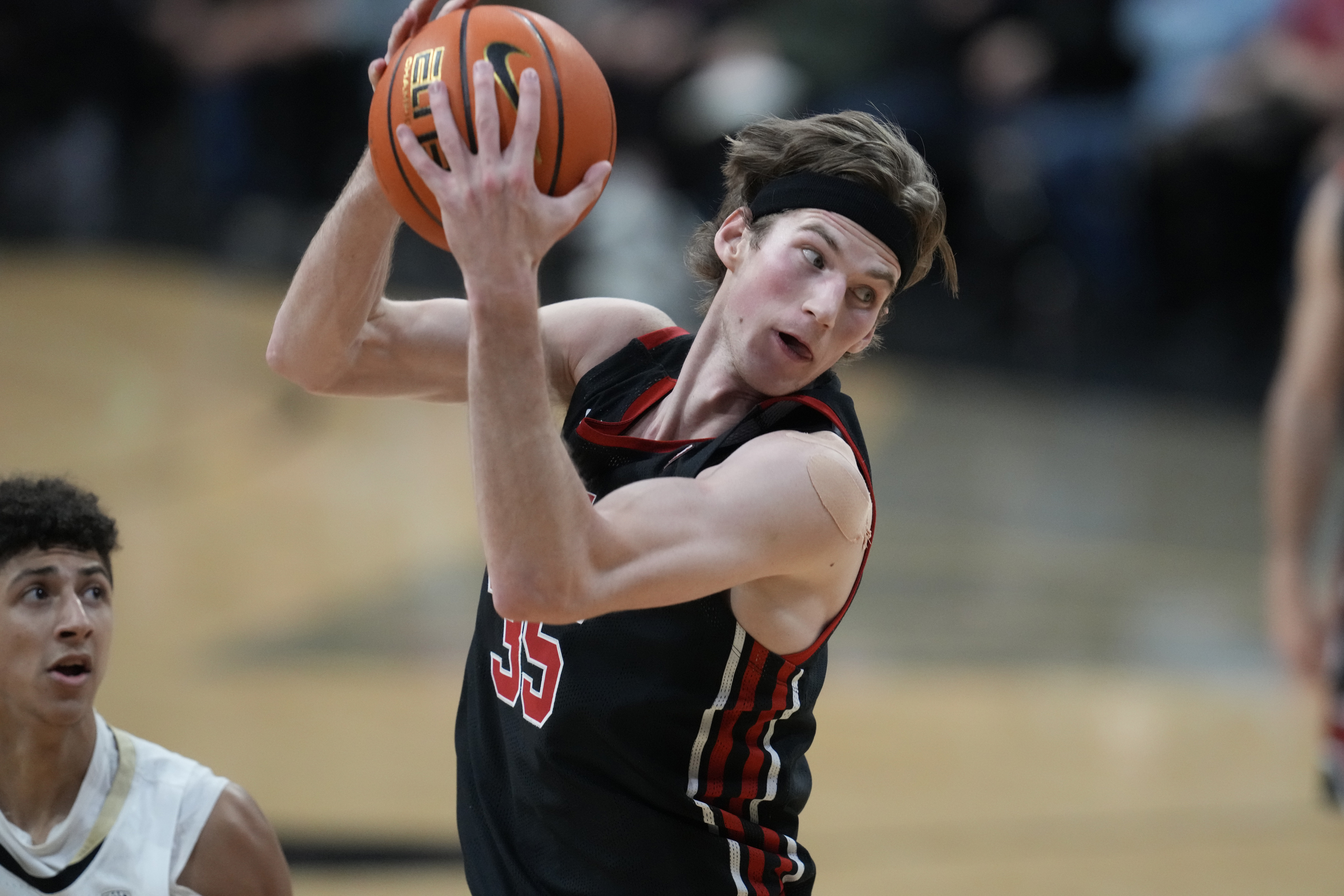 Branden Carlson finishes with career-high 25 points as Colorado edges ...