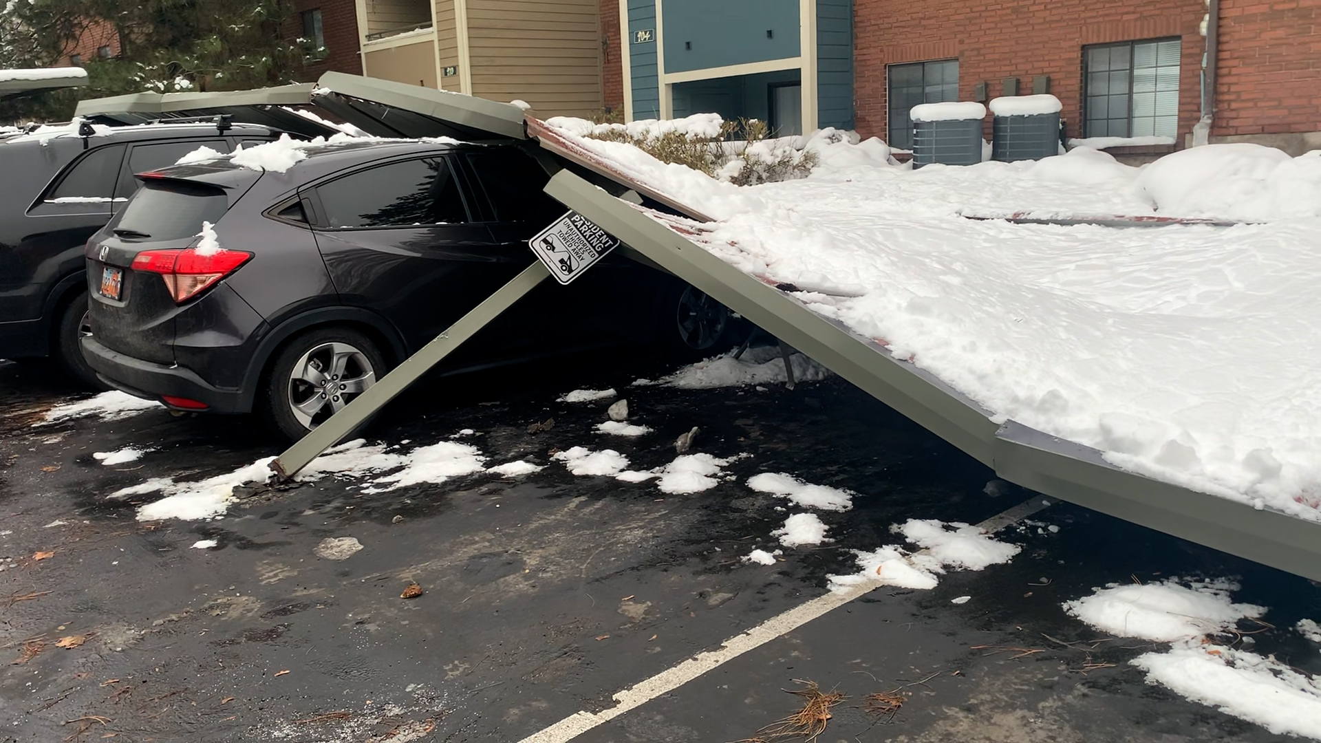 Who pays to fix crunched vehicle when a carport collapses at an ...