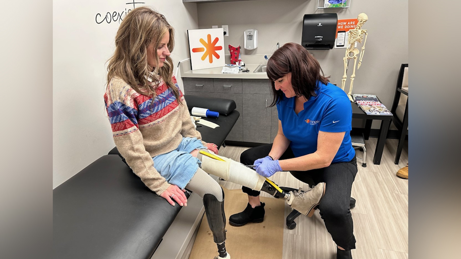 Utah woman gets new prosthetic legs 1 year after near-death experience ...