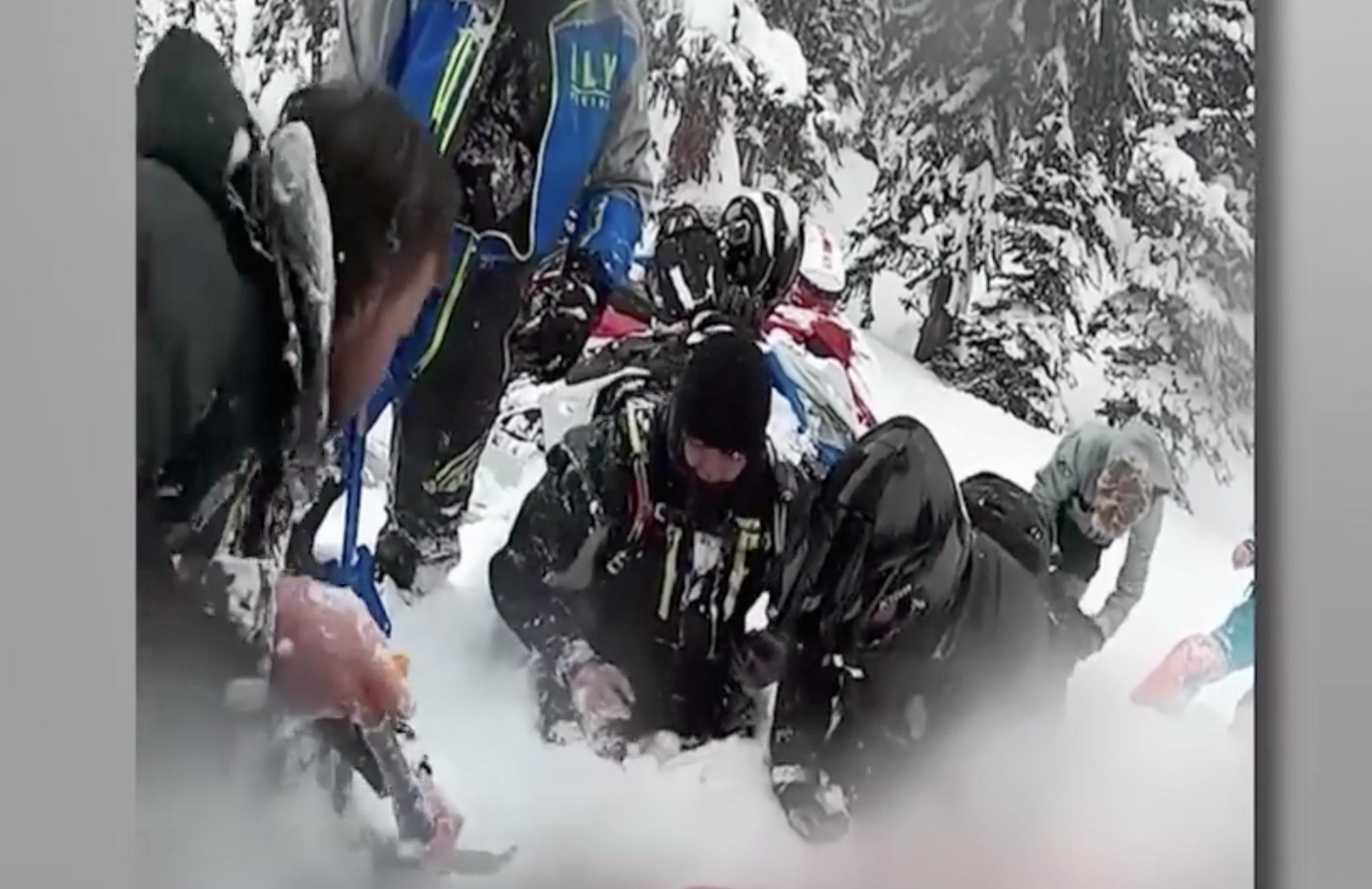 Video captures snowmobilers rescuing man buried alive in Utah County ...